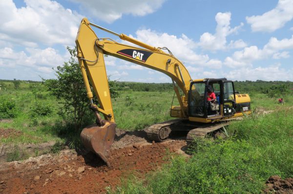 Earth moving vehicle on work | Reliance Group Tanzania