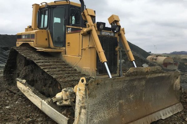 Earth moving caterpillar – Reliance Group Tanzania